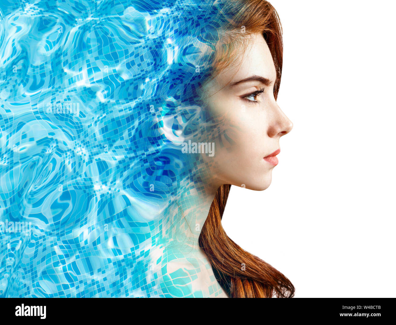Female face appears from blue water pool ripple Stock Photo - Alamy