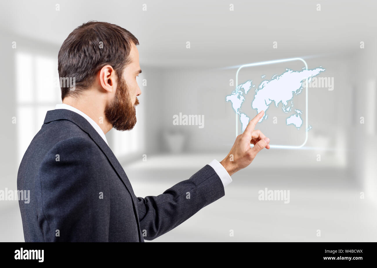 Man pointing finger world map hi-res stock photography and images - Alamy