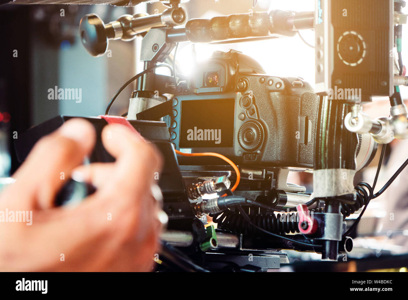 Behind the scene. cameraman shooting film scene with camera Stock Photo ...