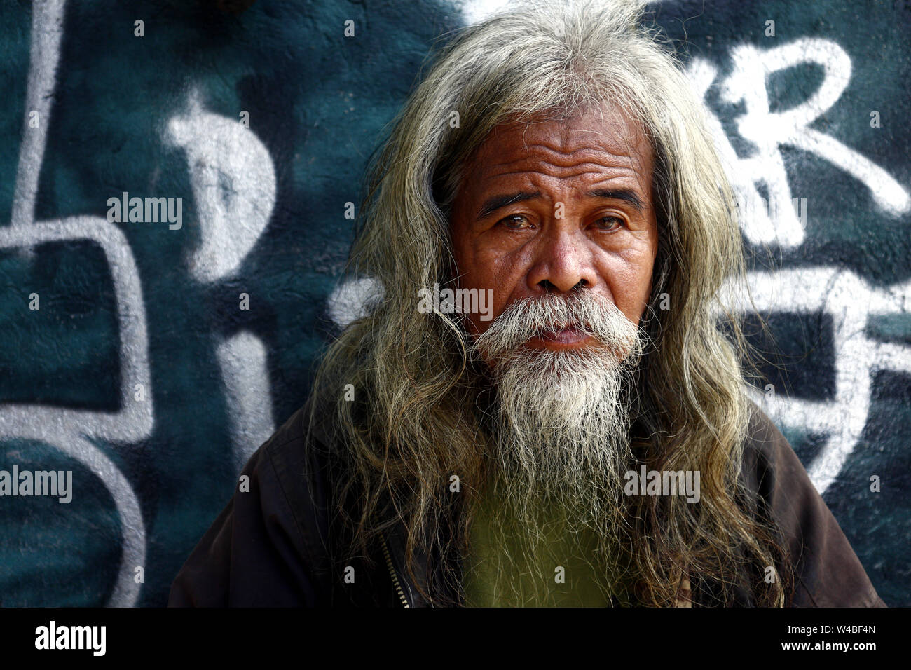 ANTIPOLO CITY, PHILIPPINES - JULY 19, 2019: A senior Filipino man with ...