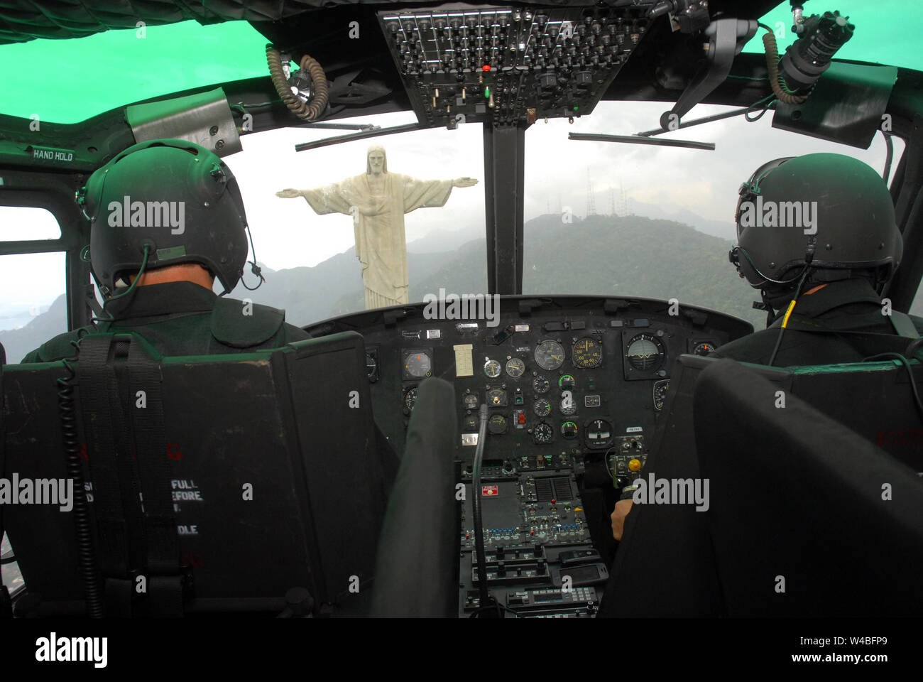 View of the pilots inside the helicopter cockpit of the Cristo Redentor ...