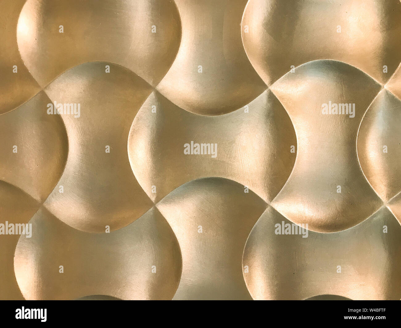 Golden 3D interior decorative wall panel with unusual geometric shape ...