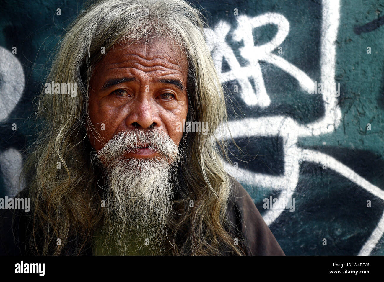 ANTIPOLO CITY, PHILIPPINES - JULY 19, 2019: A senior Filipino man with ...