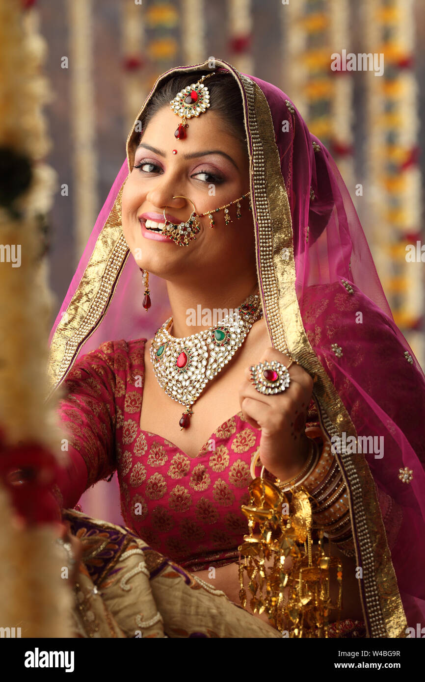 Portrait of an Indian bride smiling Stock Photo - Alamy