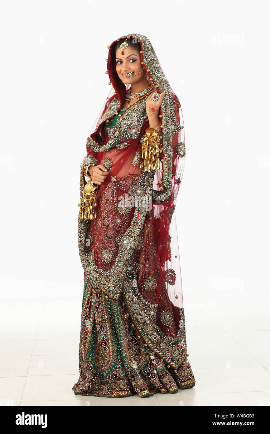 Indian bride standing Stock Photo - Alamy