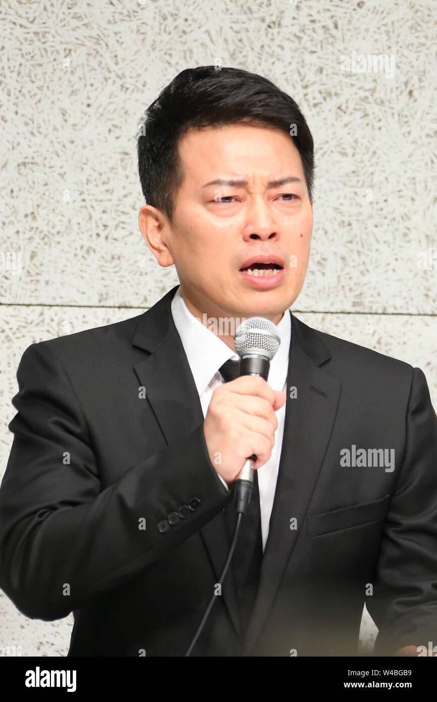 Japanese comedians Hiroyuki Miyasako and Ryo Tamura (unseen) attend a ...