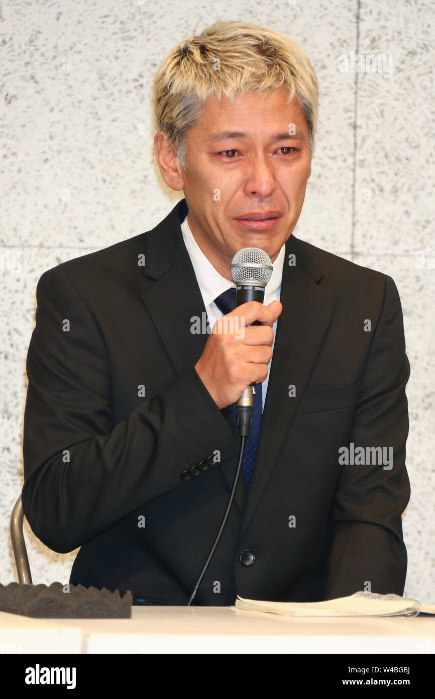 Japanese comedians Ryo Tamura and Hiroyuki Miyasako (unseen) attend a ...