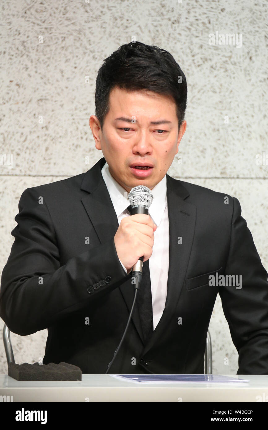 Japanese comedians Hiroyuki Miyasako and Ryo Tamura (unseen) attend a ...