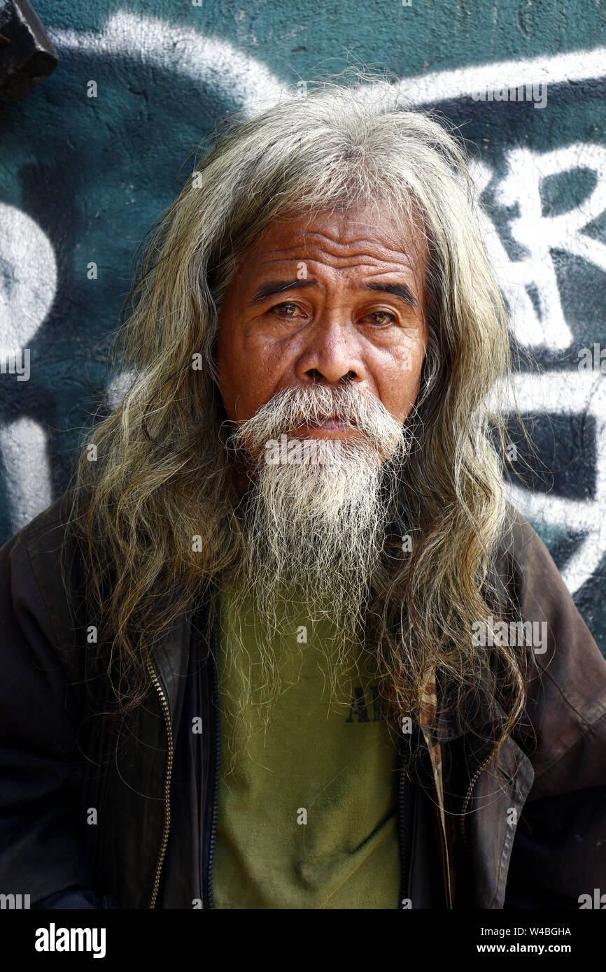 ANTIPOLO CITY, PHILIPPINES - JULY 19, 2019: A senior Filipino man with ...