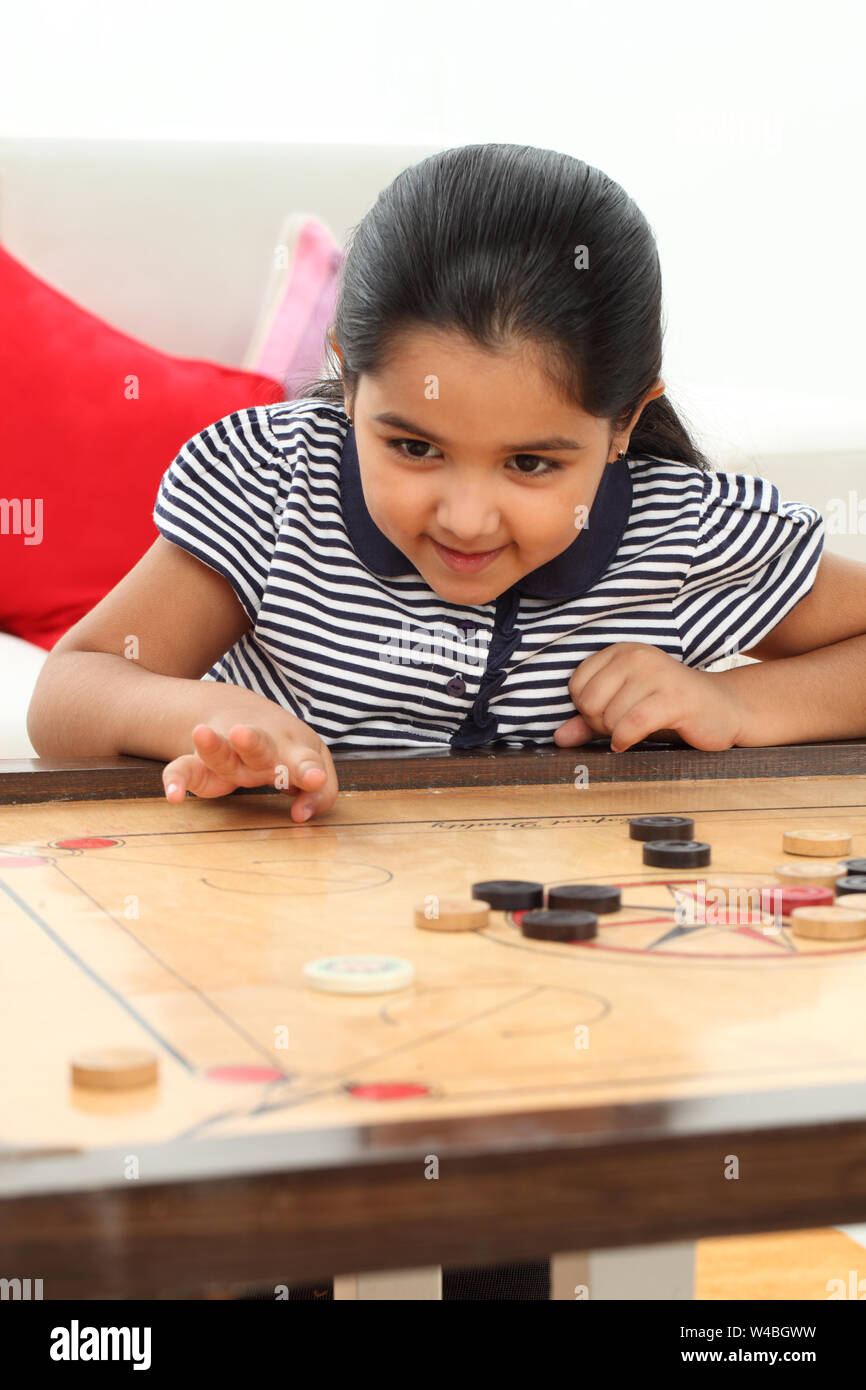 Carrom playing hi-res stock photography and images - Alamy