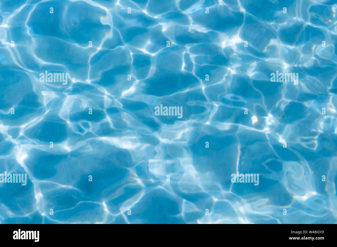 The surface of azure water as a background Stock Photo - Alamy