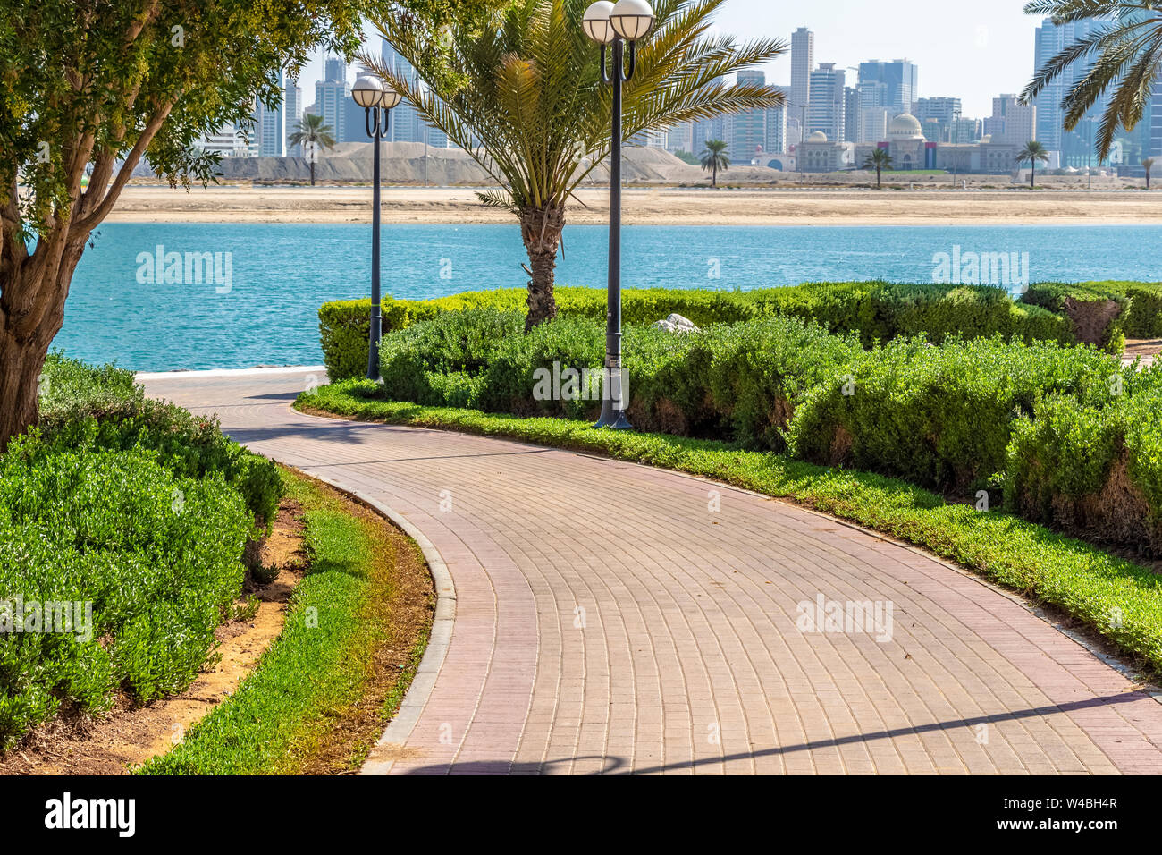 Beautiful park footpath along the city beach Stock Photo - Alamy