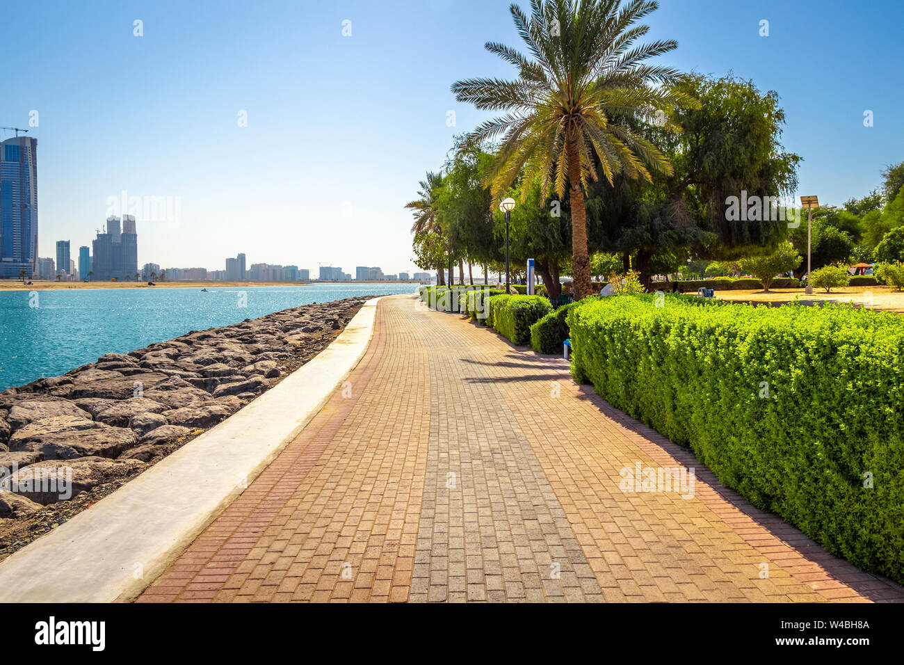 Beautiful park footpath along the city beach Stock Photo - Alamy