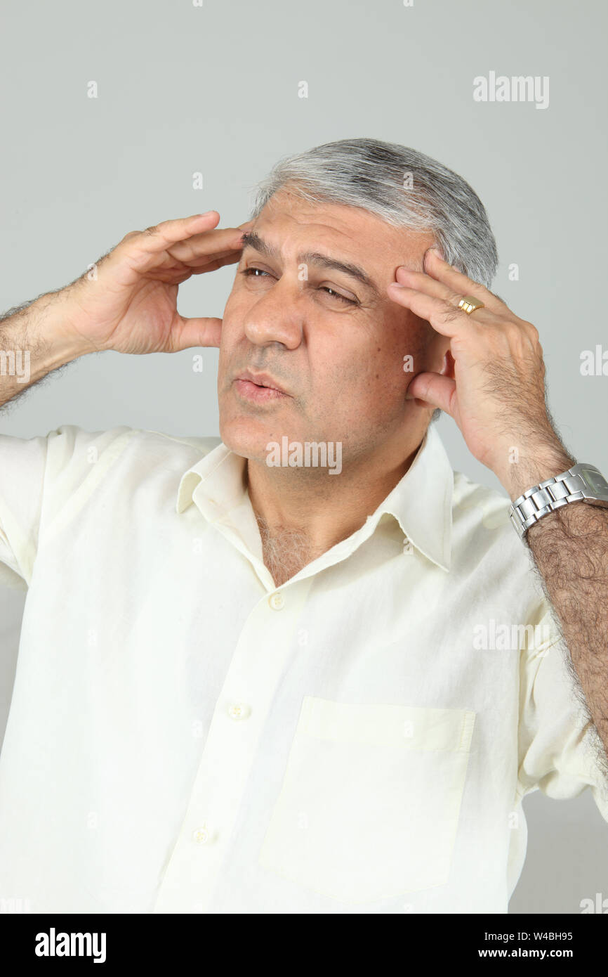 Old man suffering from headache Stock Photo - Alamy Old man suffering from headache Stock Photo - Alamy
