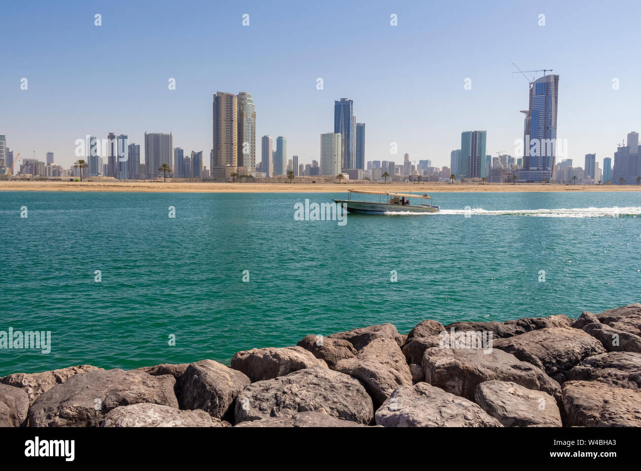 Modern city on the shores of the azure sea Stock Photo - Alamy