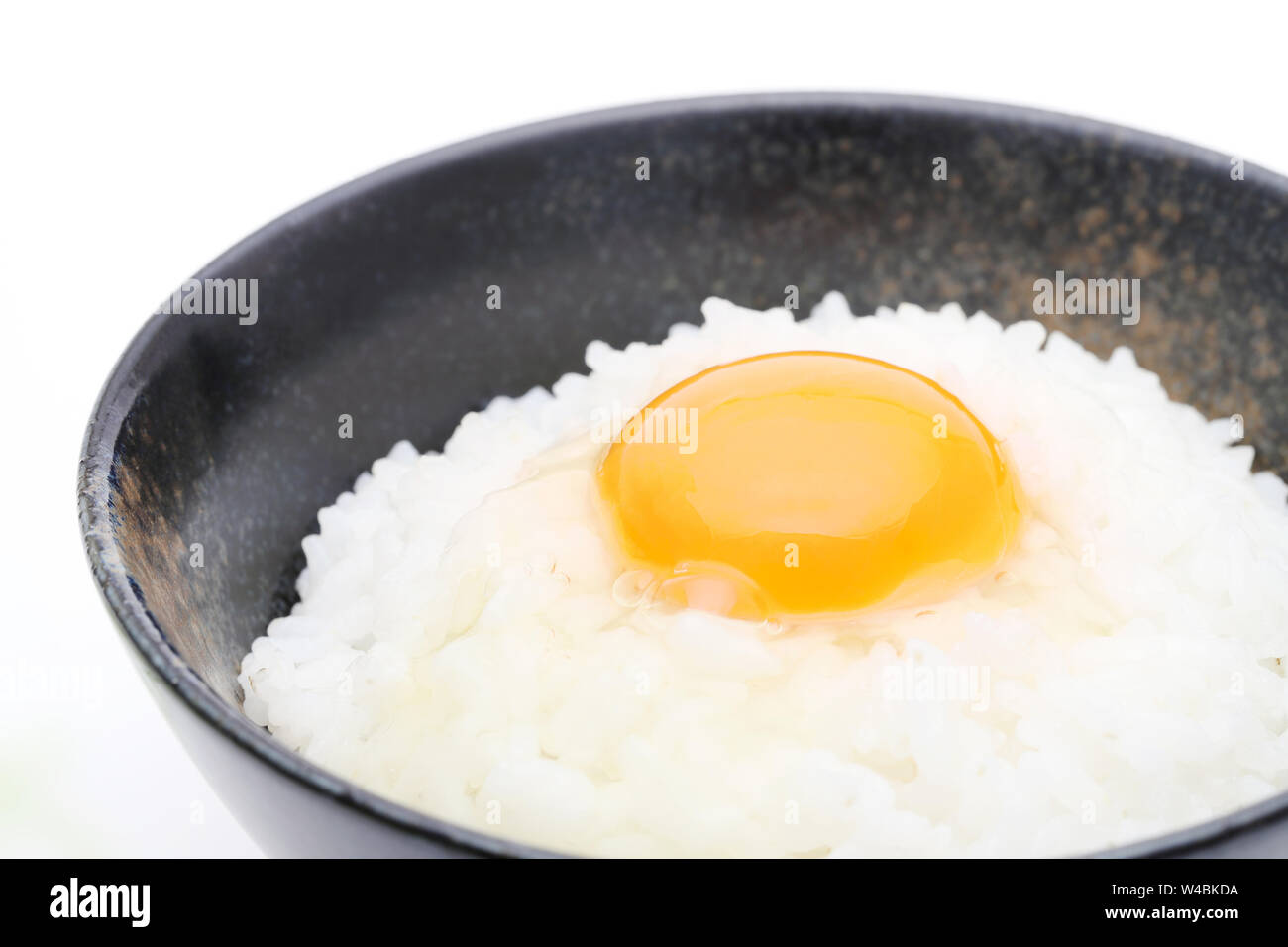 Japanese cooked rice with raw egg, Tamago kake gohan Stock Photo - Alamy