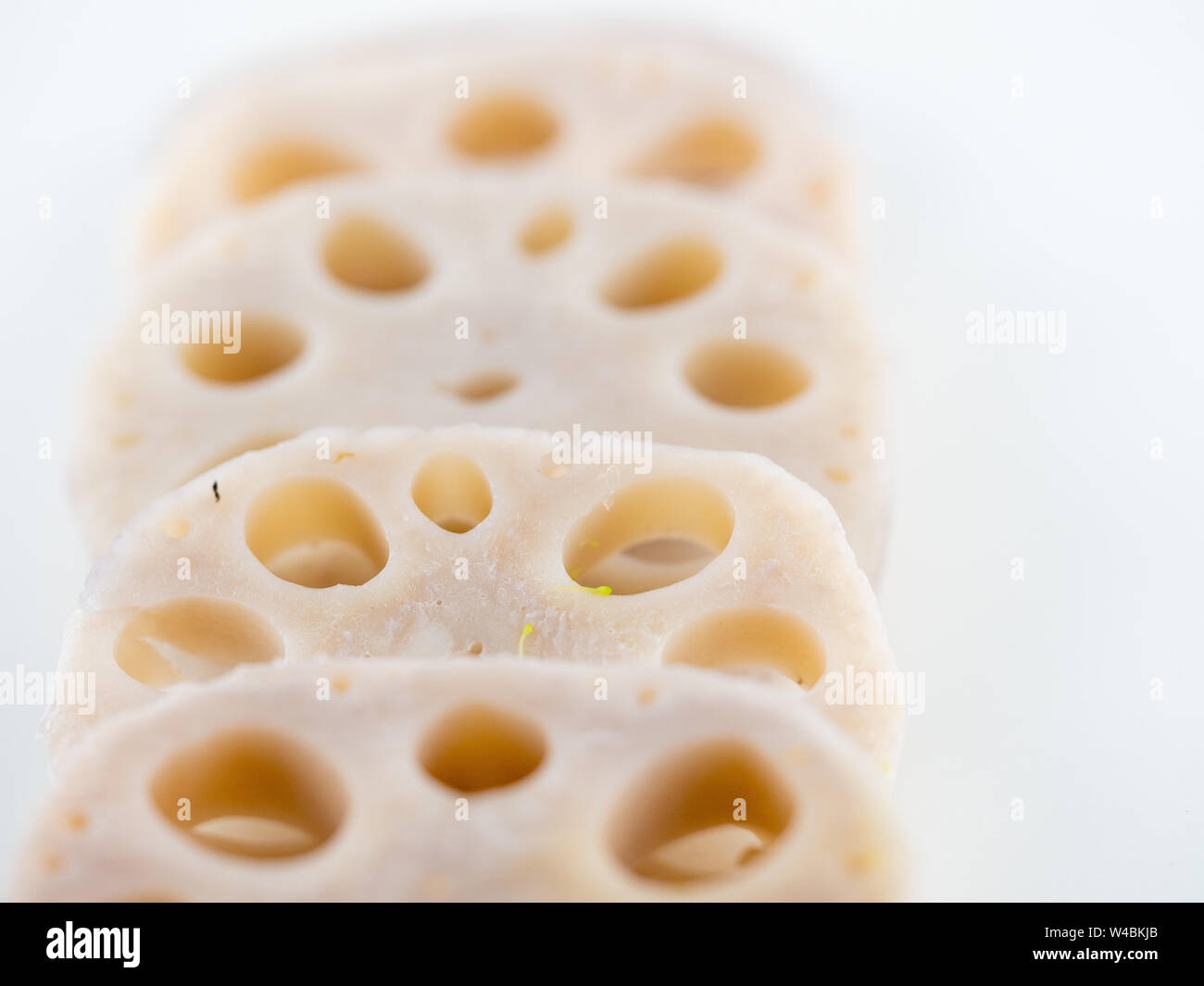 Lotus root isolated on white background Stock Photo - Alamy