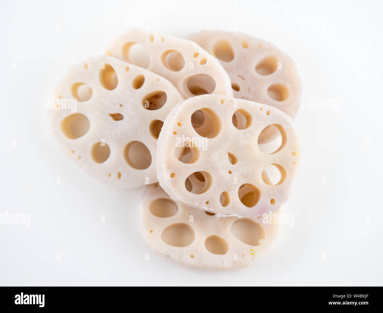 Lotus root isolated on white background Stock Photo - Alamy