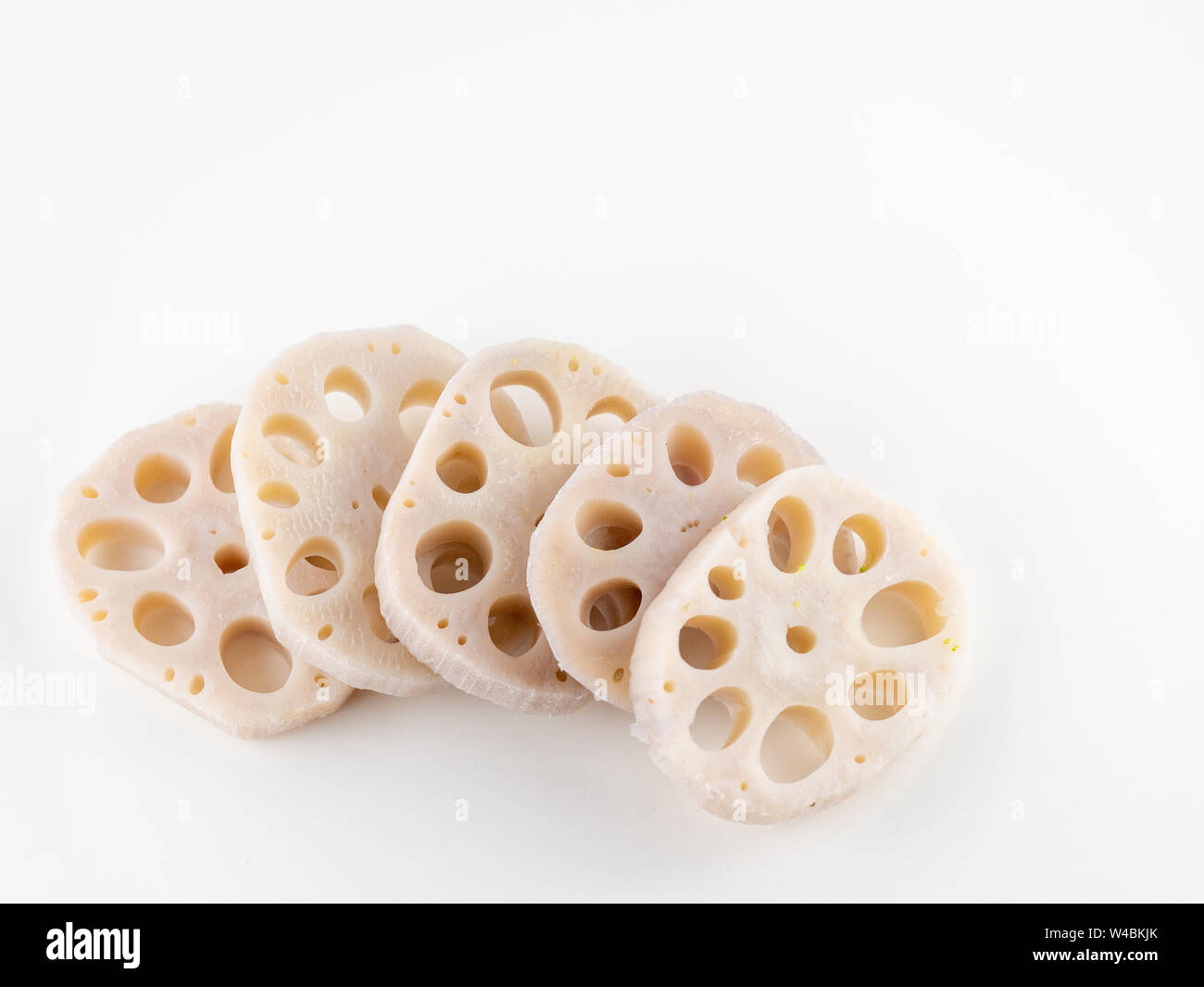 Lotus root isolated on white background Stock Photo - Alamy