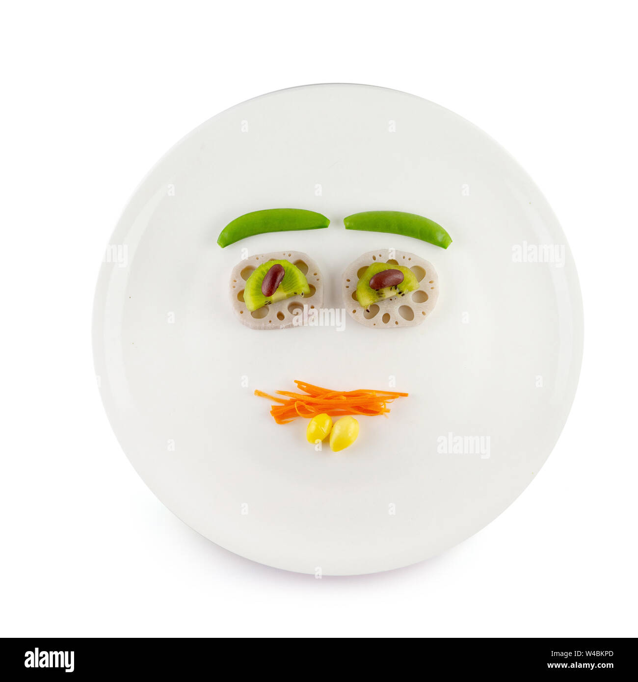 Fun food for kids - cute smiling clown face on salad decorated with ...