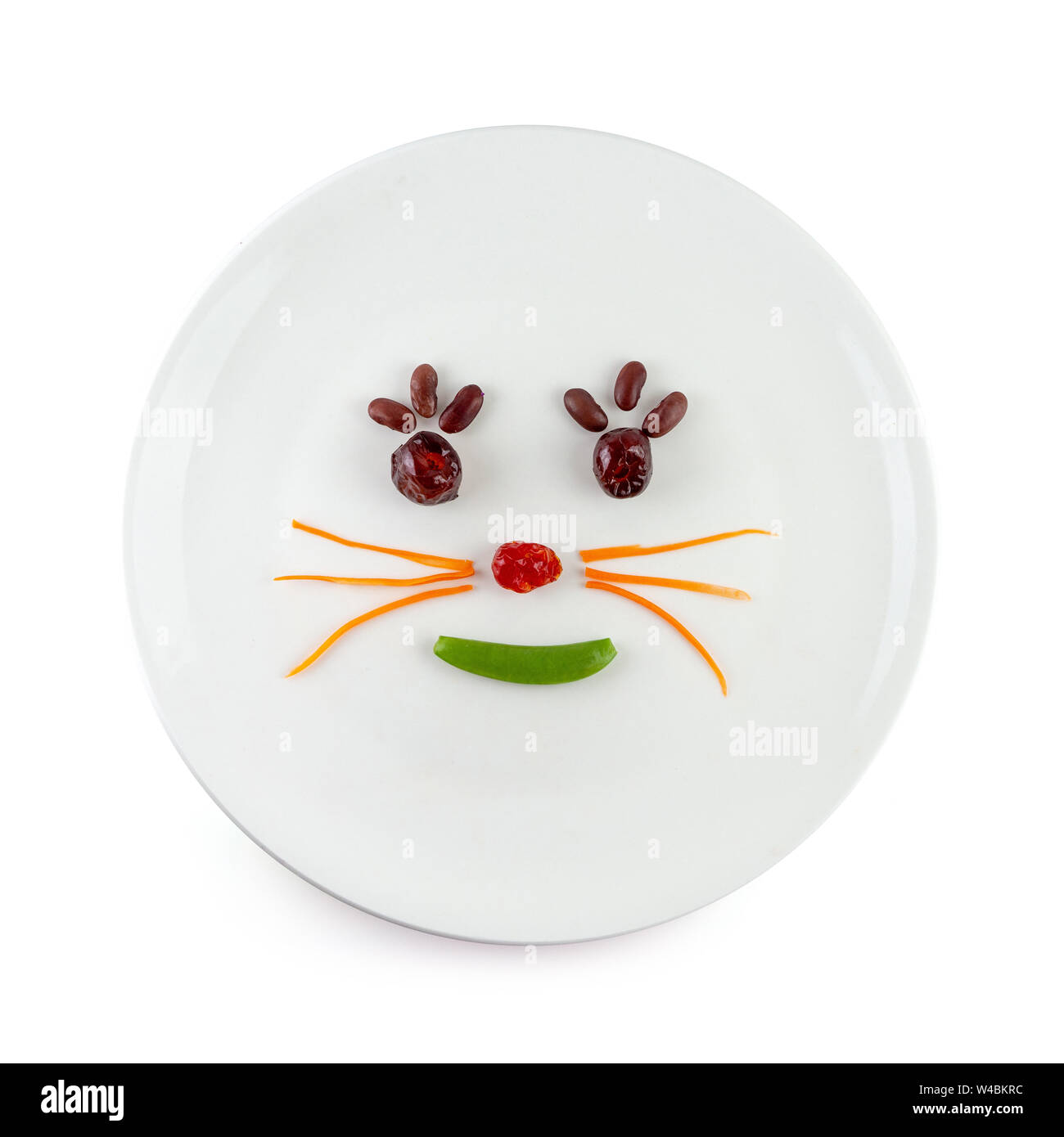 Fun food for kids - cute smiling clown face on salad decorated with ...