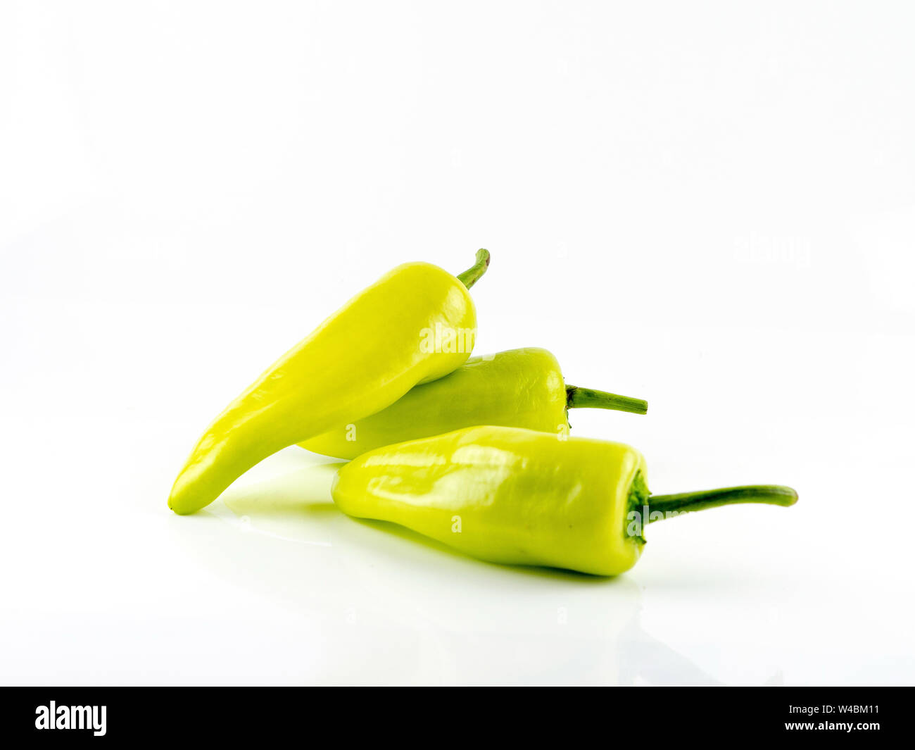 Fresh green peppers isolated on white background Stock Photo - Alamy