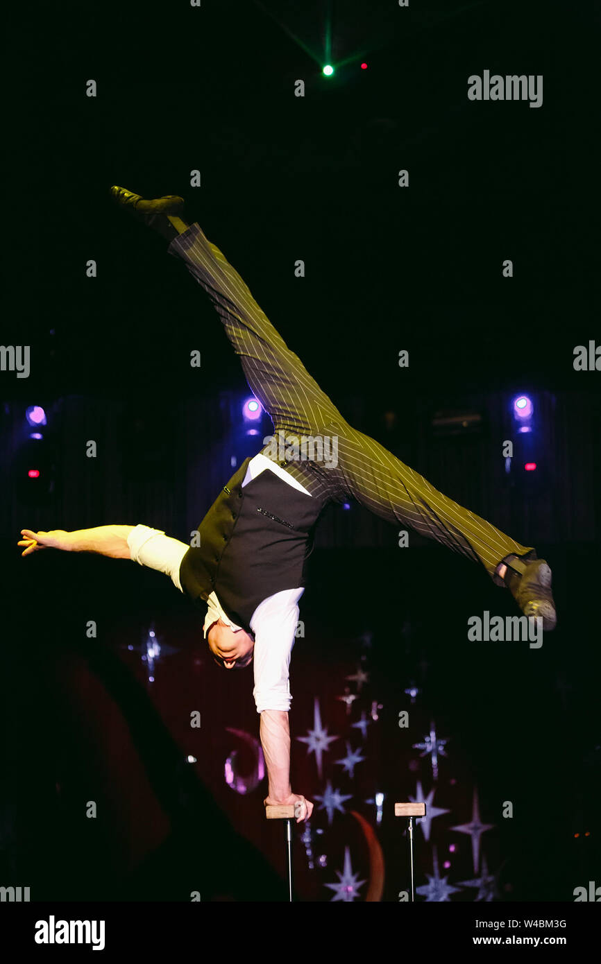 Handstand act hi-res stock photography and images - Alamy