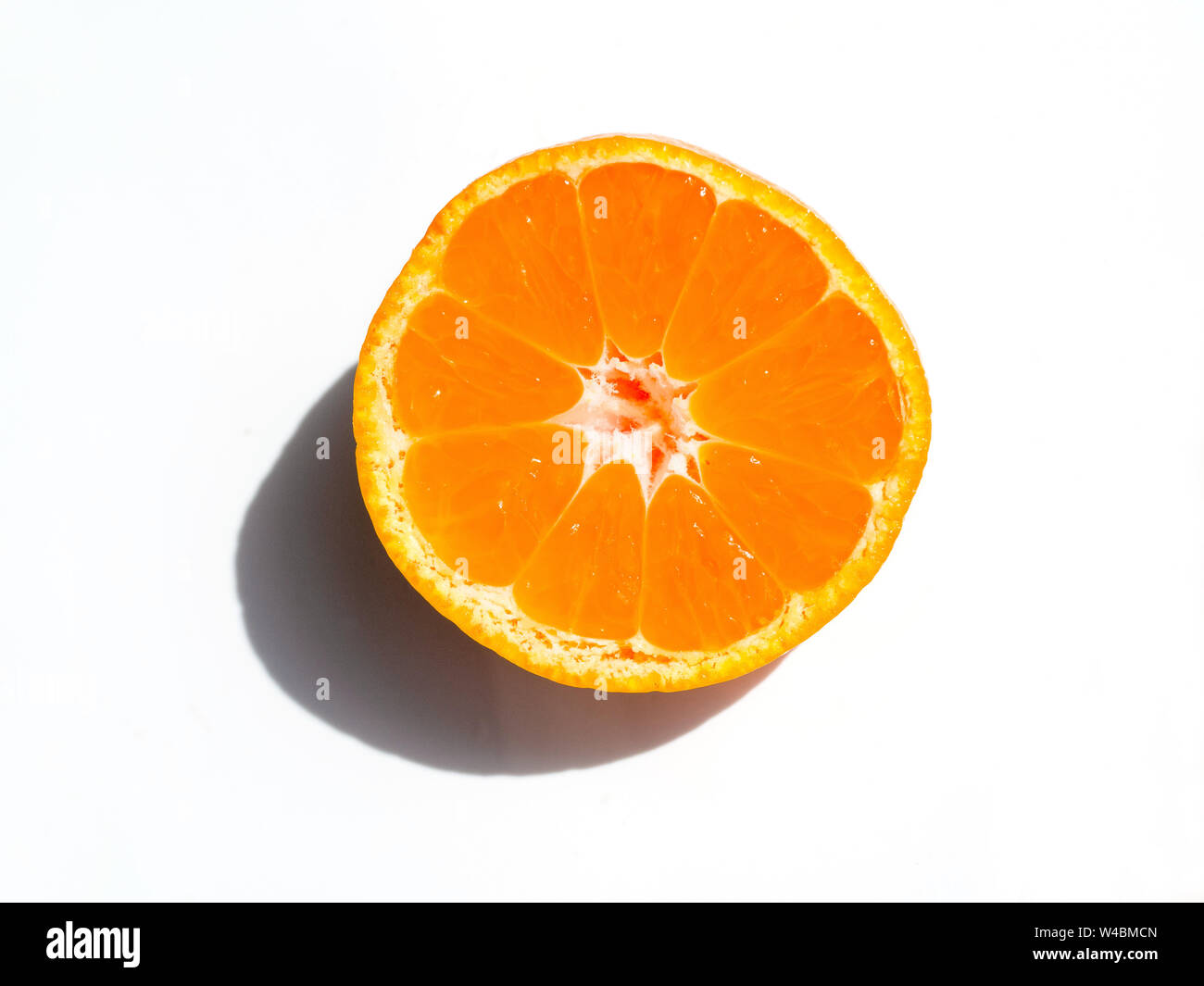Orange fruit slice top view isolated on white background Stock Photo - Alamy