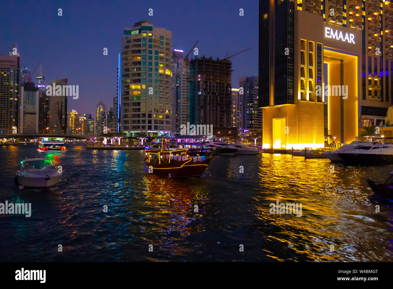 Dubai, UAE - November 29, 2018: Dubai's high rise houses in the evening ...
