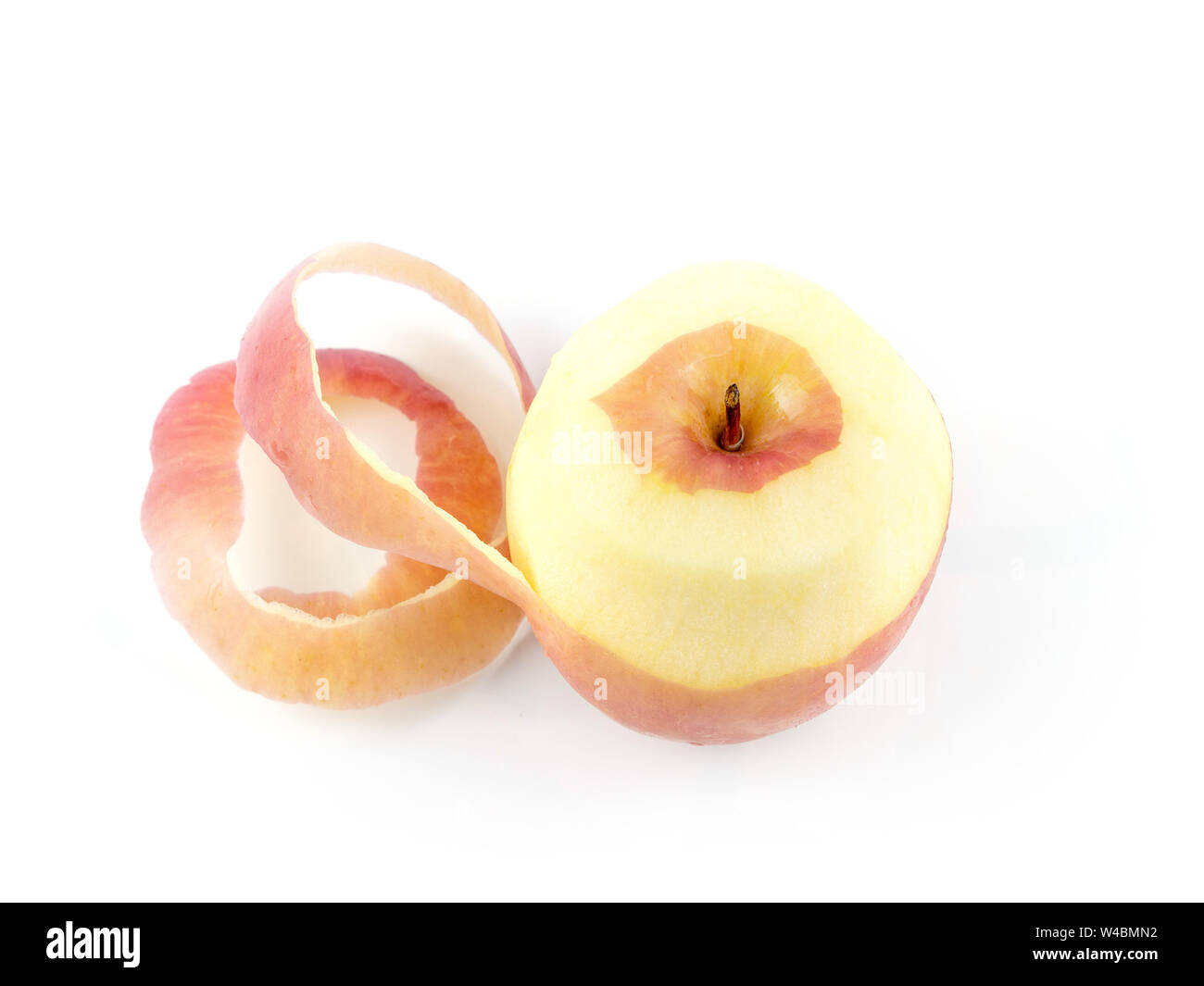 apple with peeled skin on white background Stock Photo - Alamy