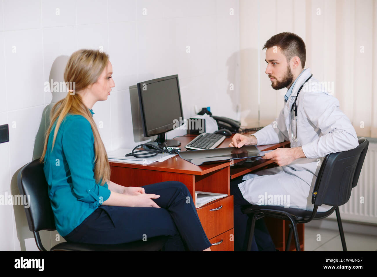 Male patient reception desk hi-res stock photography and images - Alamy