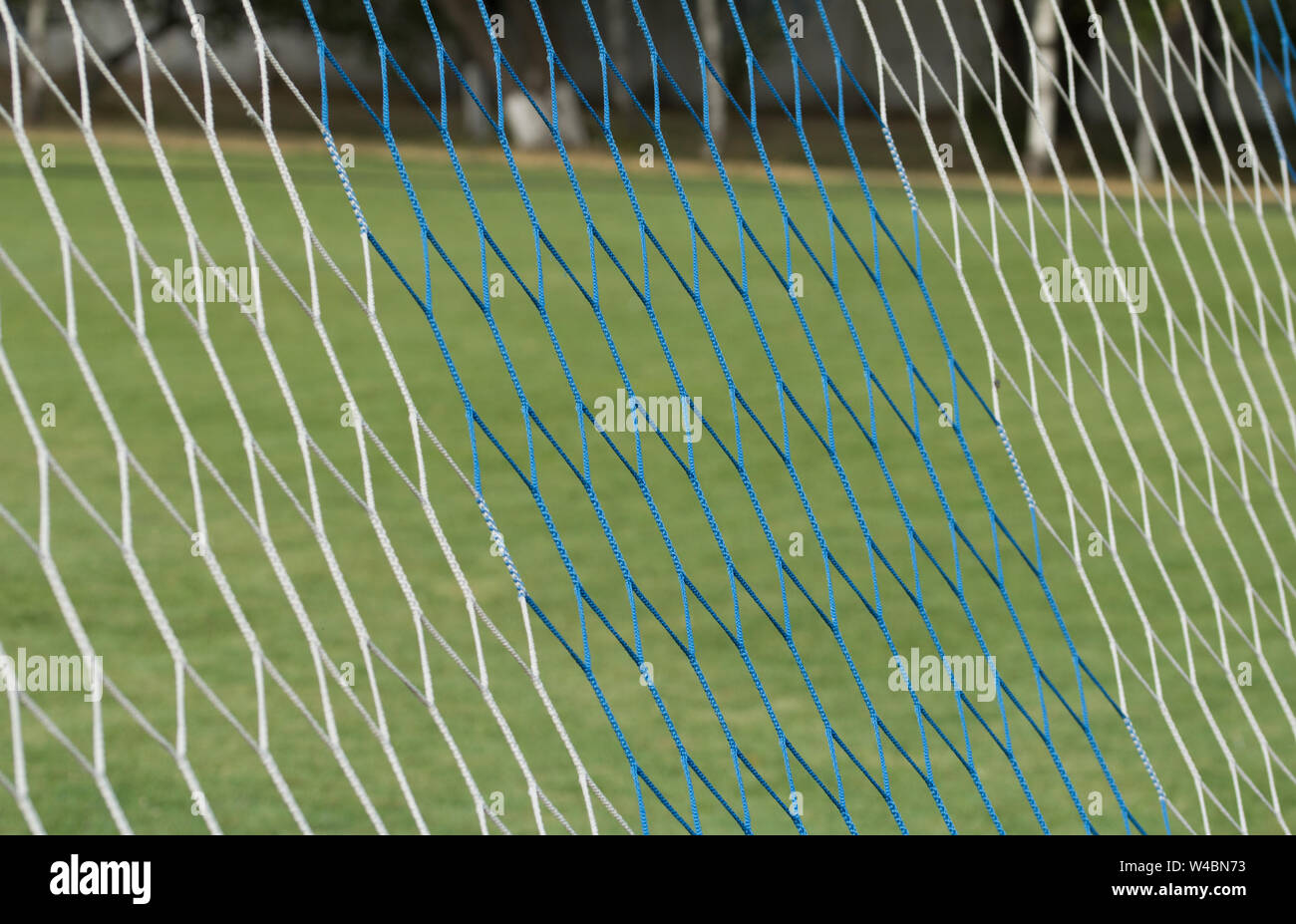 Soccer or football net background. Football net close up on blurred ...