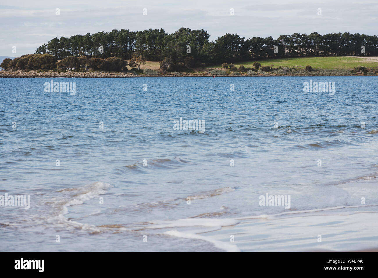 sunny Australian beach in Cremorne, Tasmania looking beautiful and ...