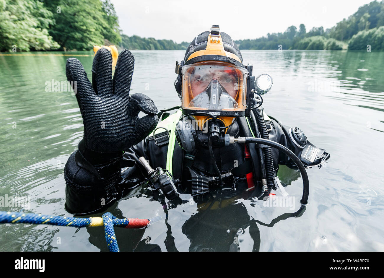 13 July 2019, Schleswig-Holstein, Wacken: A fire diver gives the OK ...