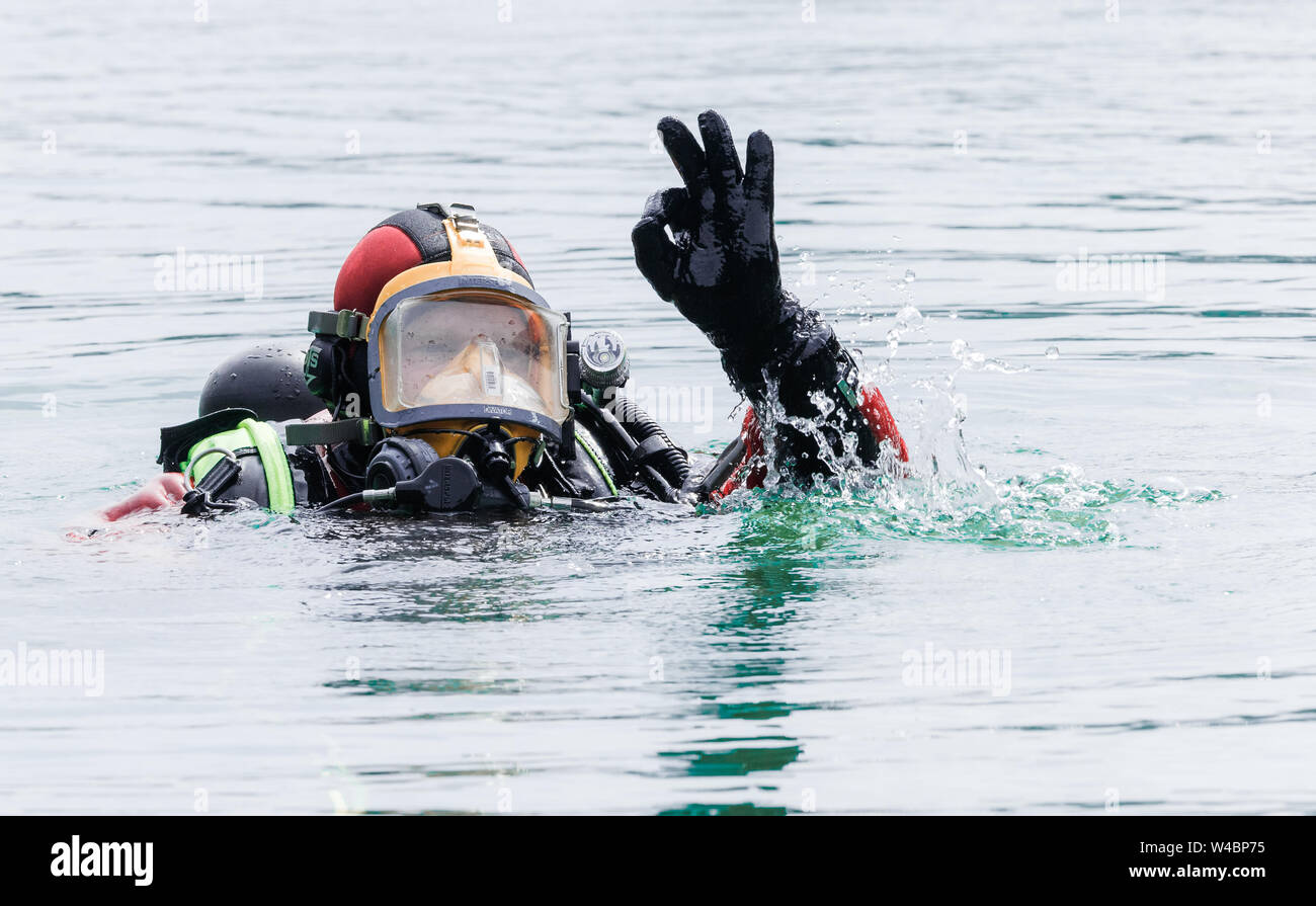13 July 2019, Schleswig-Holstein, Wacken: A fire diver gives the OK ...