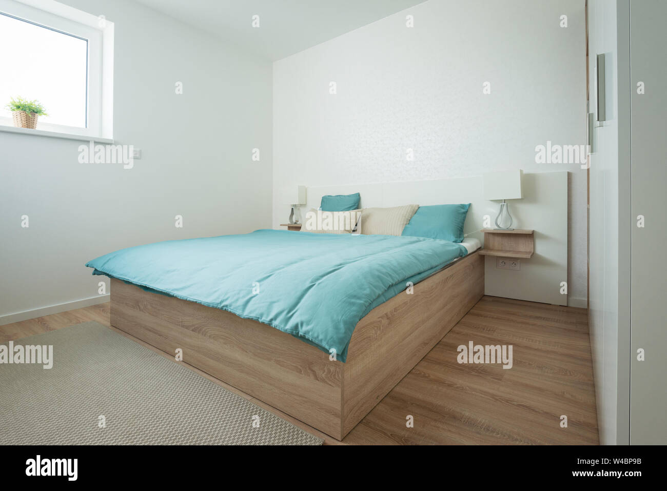 Contemporary bedroom interior of house Stock Photo - Alamy