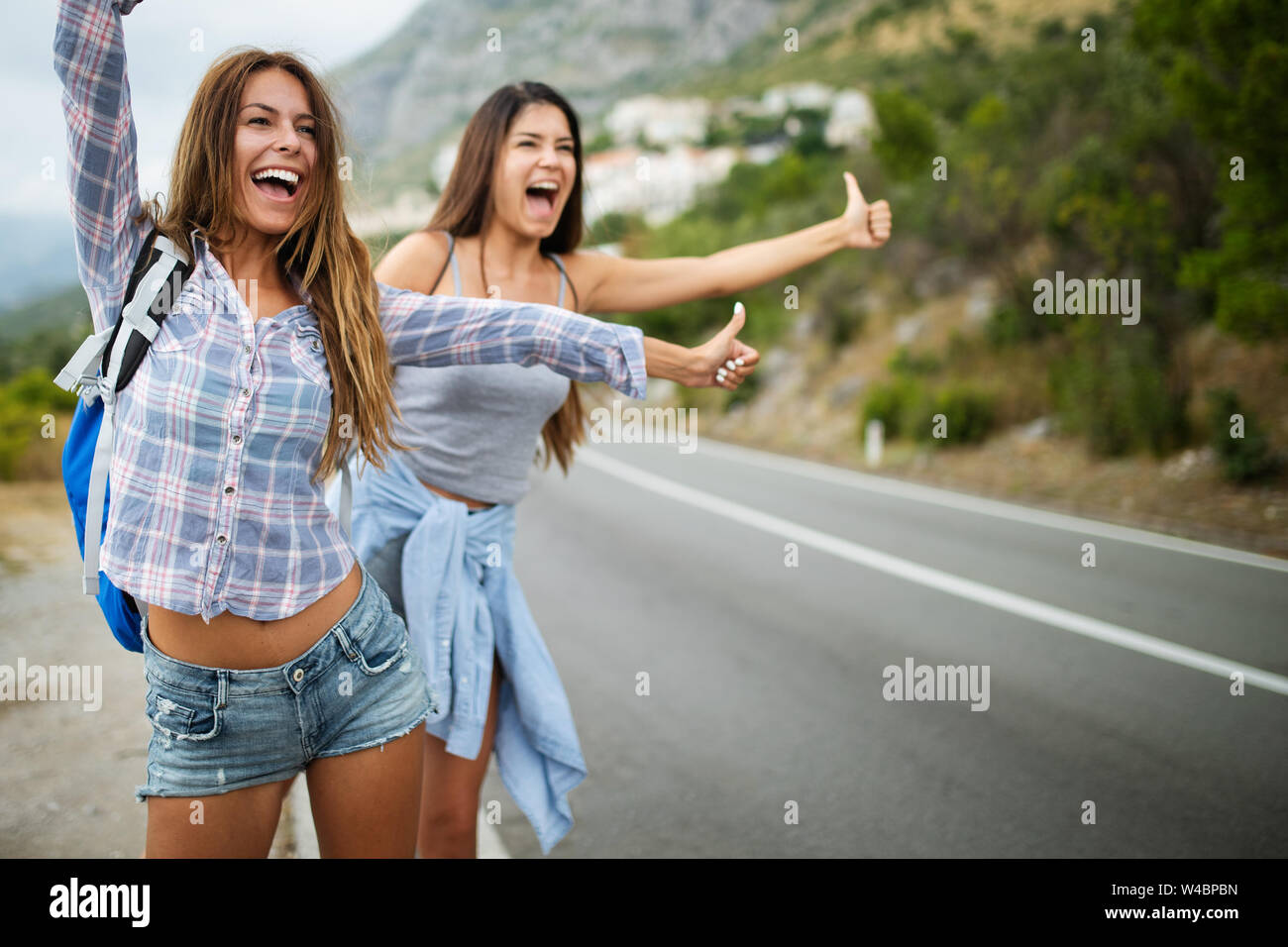 Group of happy friend traveler walking and having fun. Travel lifestyle ...