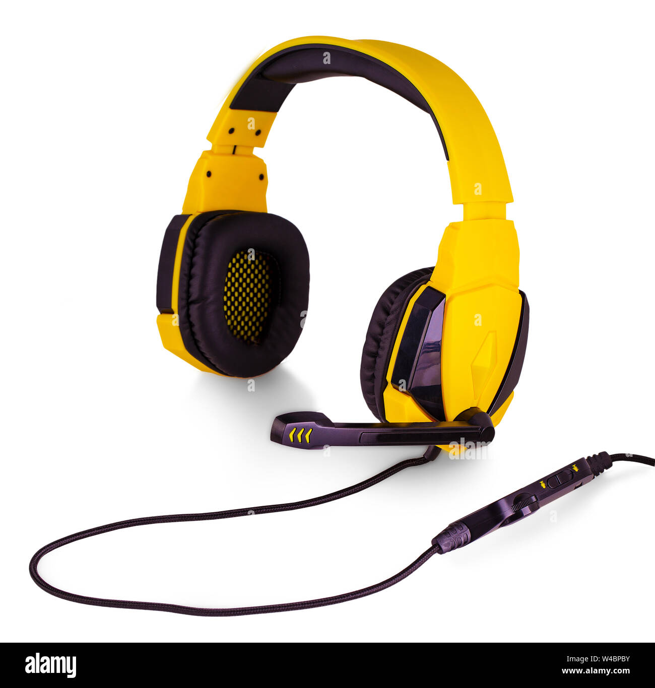 Yellow headphones with a microphone isolated on white background Stock ...