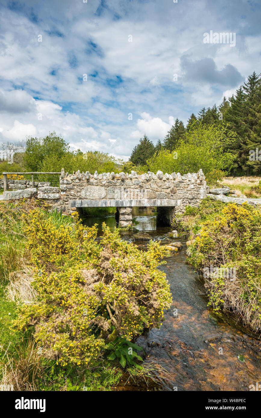 Old stone bridge near Postbridge on Dartmoor in Devon, West Country ...