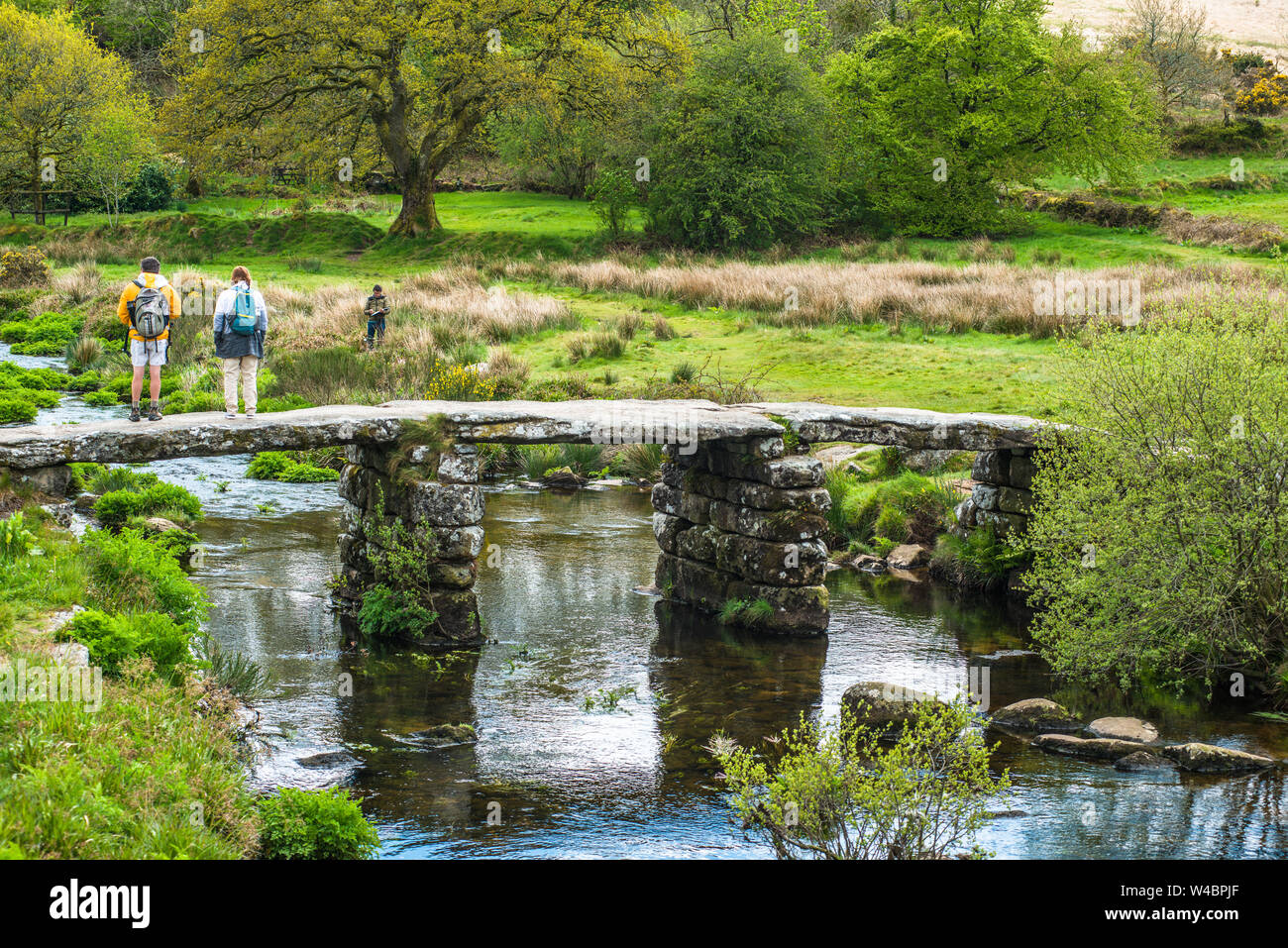 Medieval clapper bridge over the East Dart River at Postbridge on ...