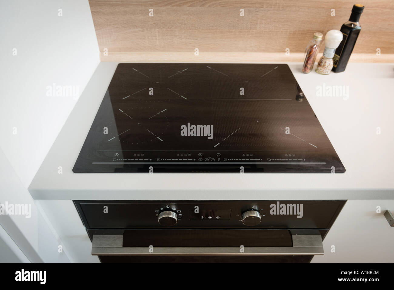 Electric stove with induction cooktop in contemporary kitchen Stock ...