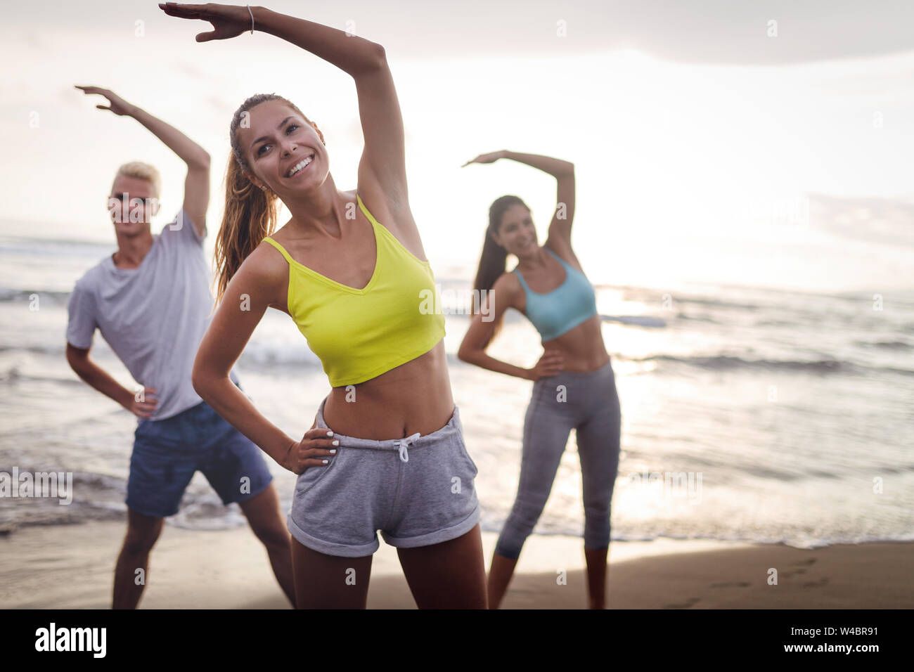 Group beach fitness hi-res stock photography and images - Alamy