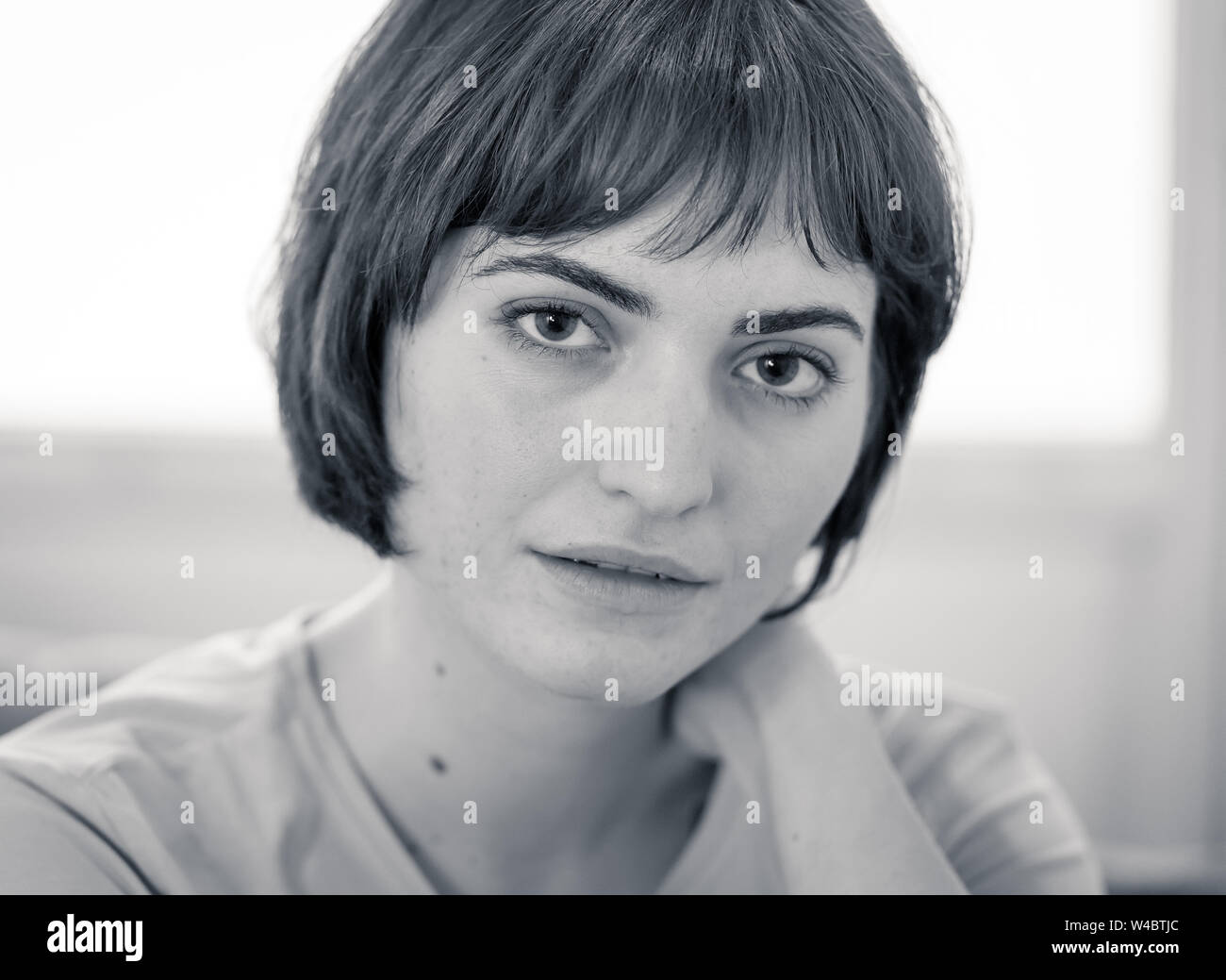 Black and white portrait of young beautiful woman with happy face ...