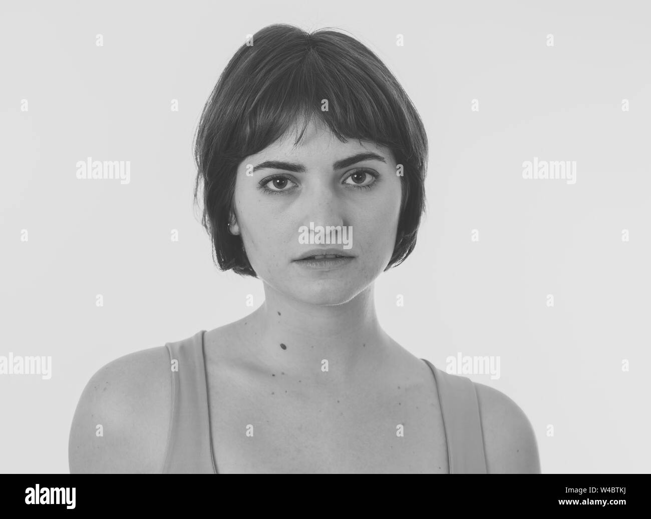 Black And White Portrait Of Young Sad Woman Serious And Concerned