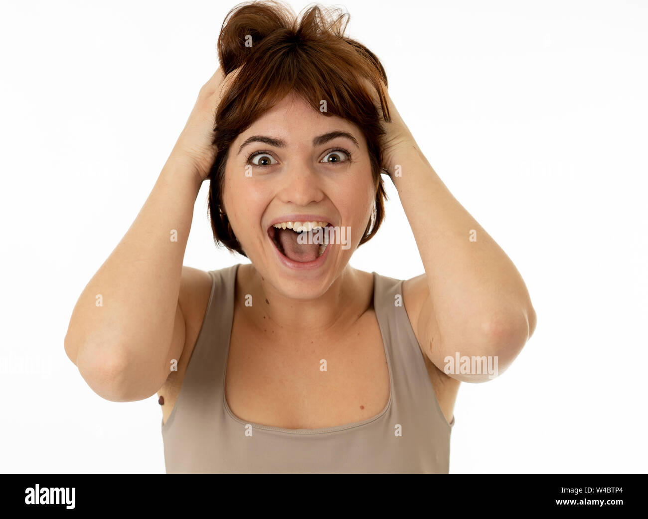 Portrait of beautiful shocked woman hearing good news or having great ...