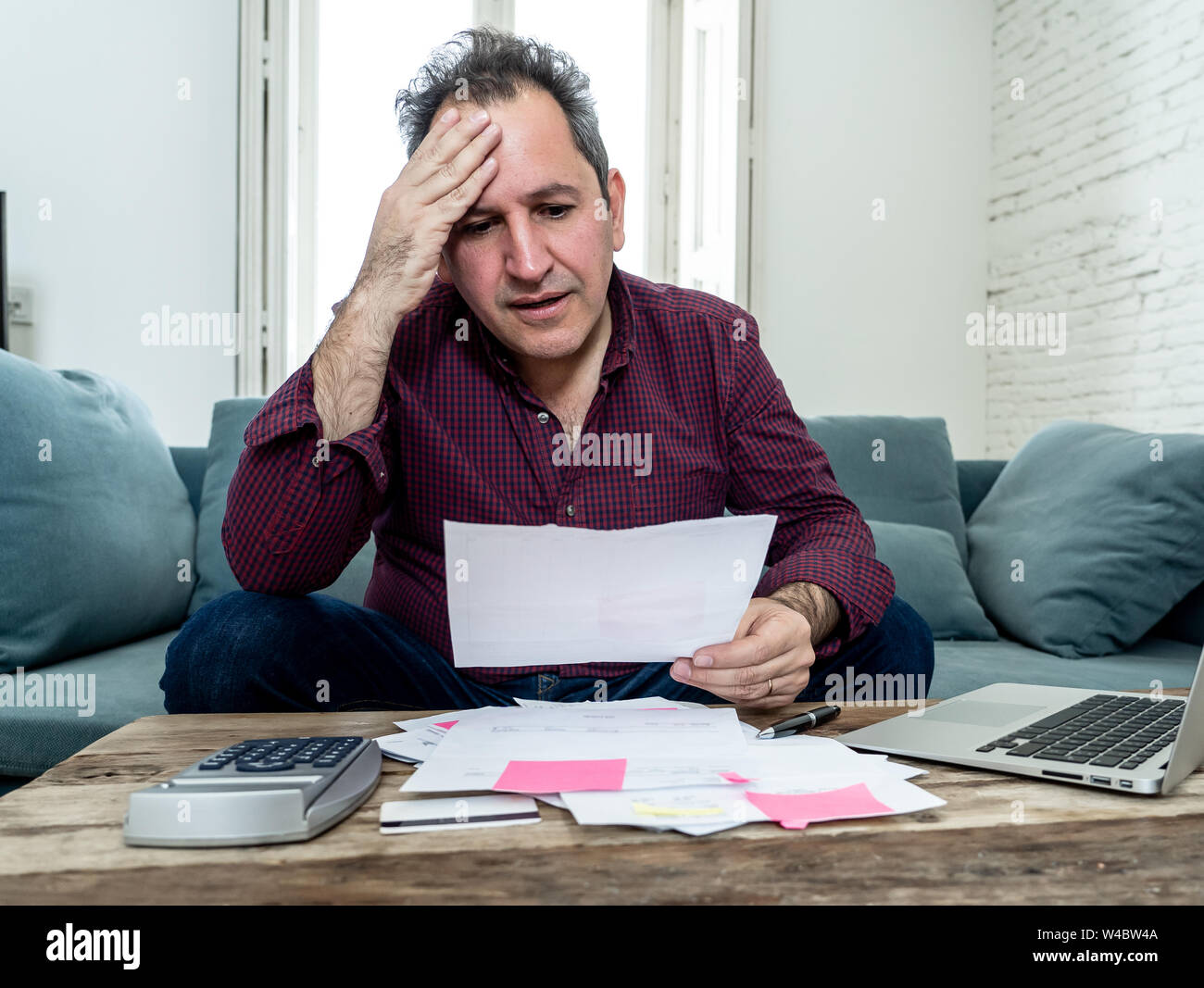 Man middle aged stressed bills hi-res stock photography and images - Alamy