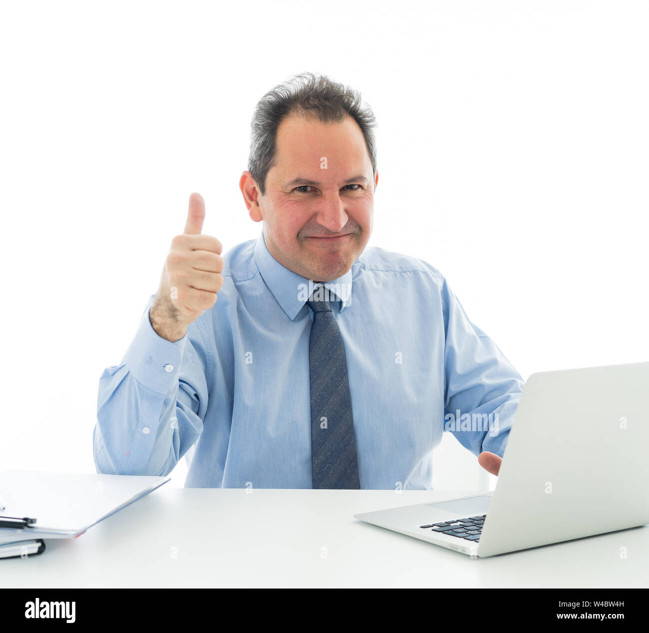 Businessman working computer thumbs up hi-res stock photography and ...