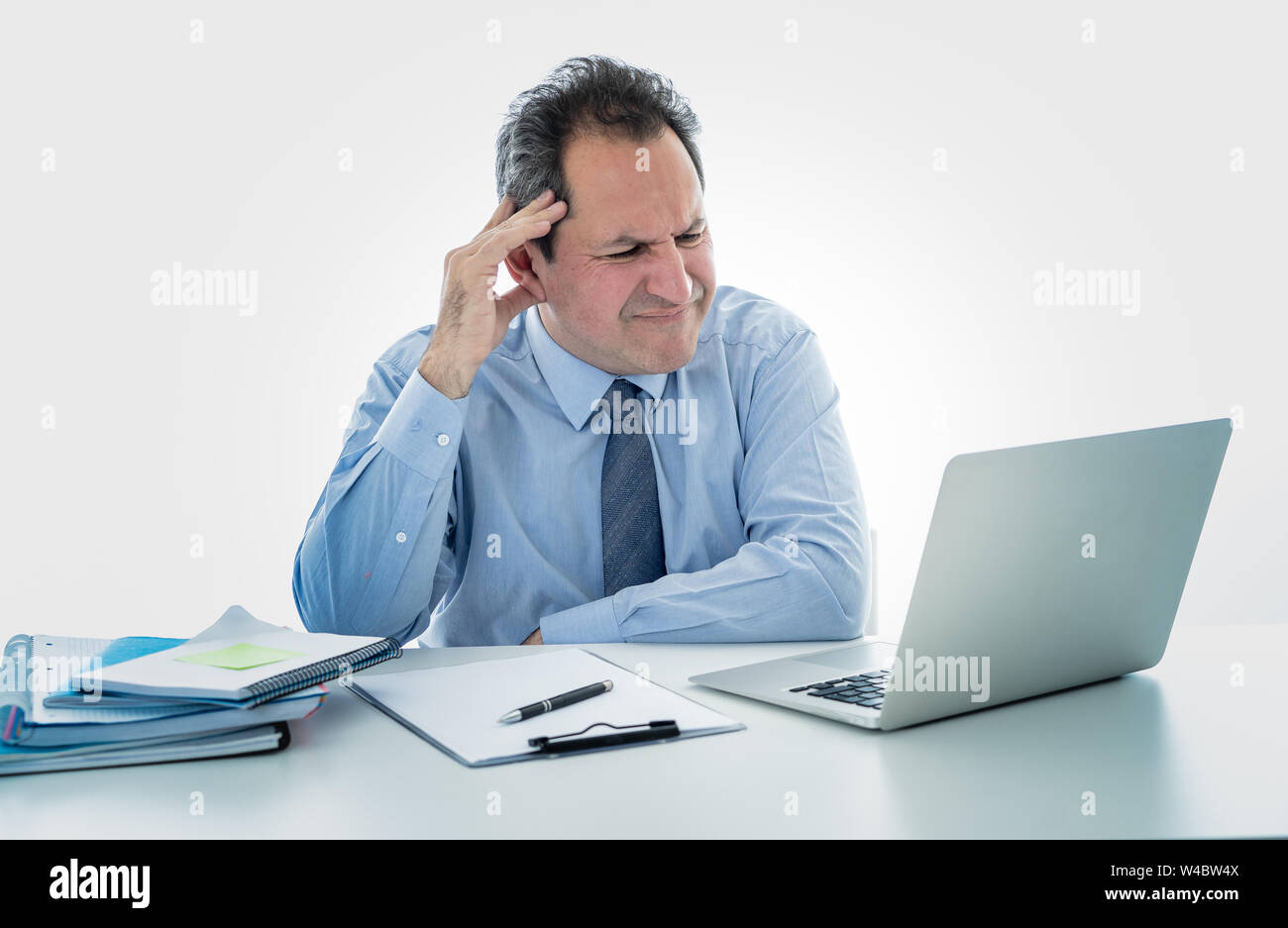 Angry and frustrated middle aged businessman overworked, upset and ...