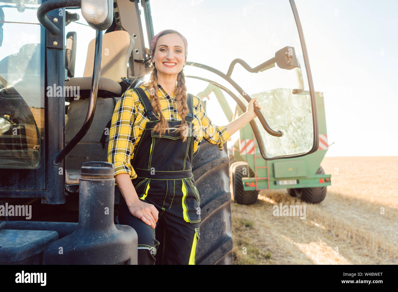 Woman driving tractor hi-res stock photography and images - Alamy