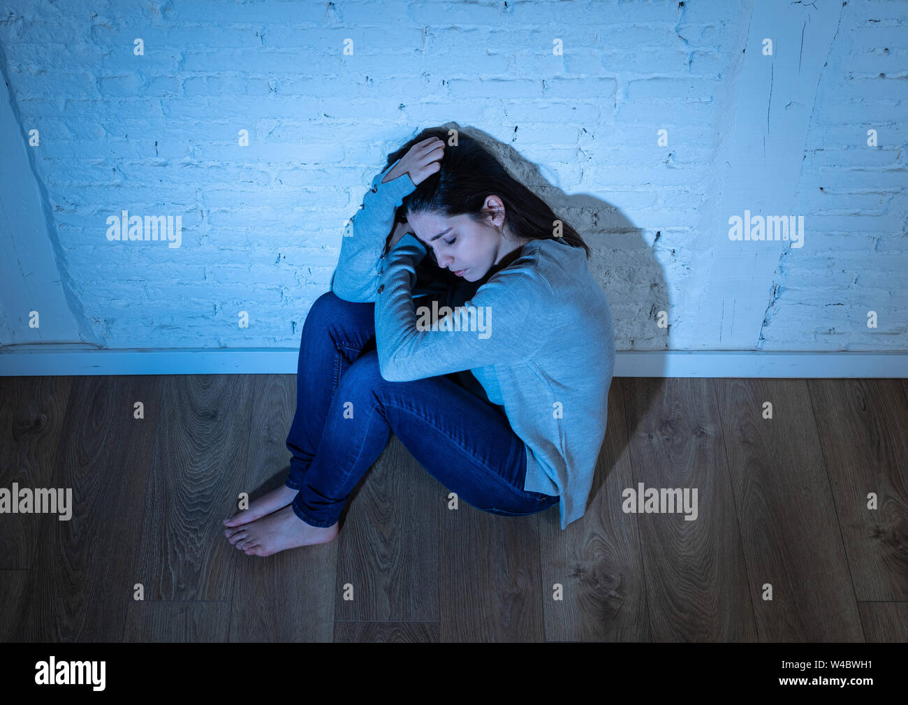 Portrait of young desperate latin woman feeling miserable, lonely ...